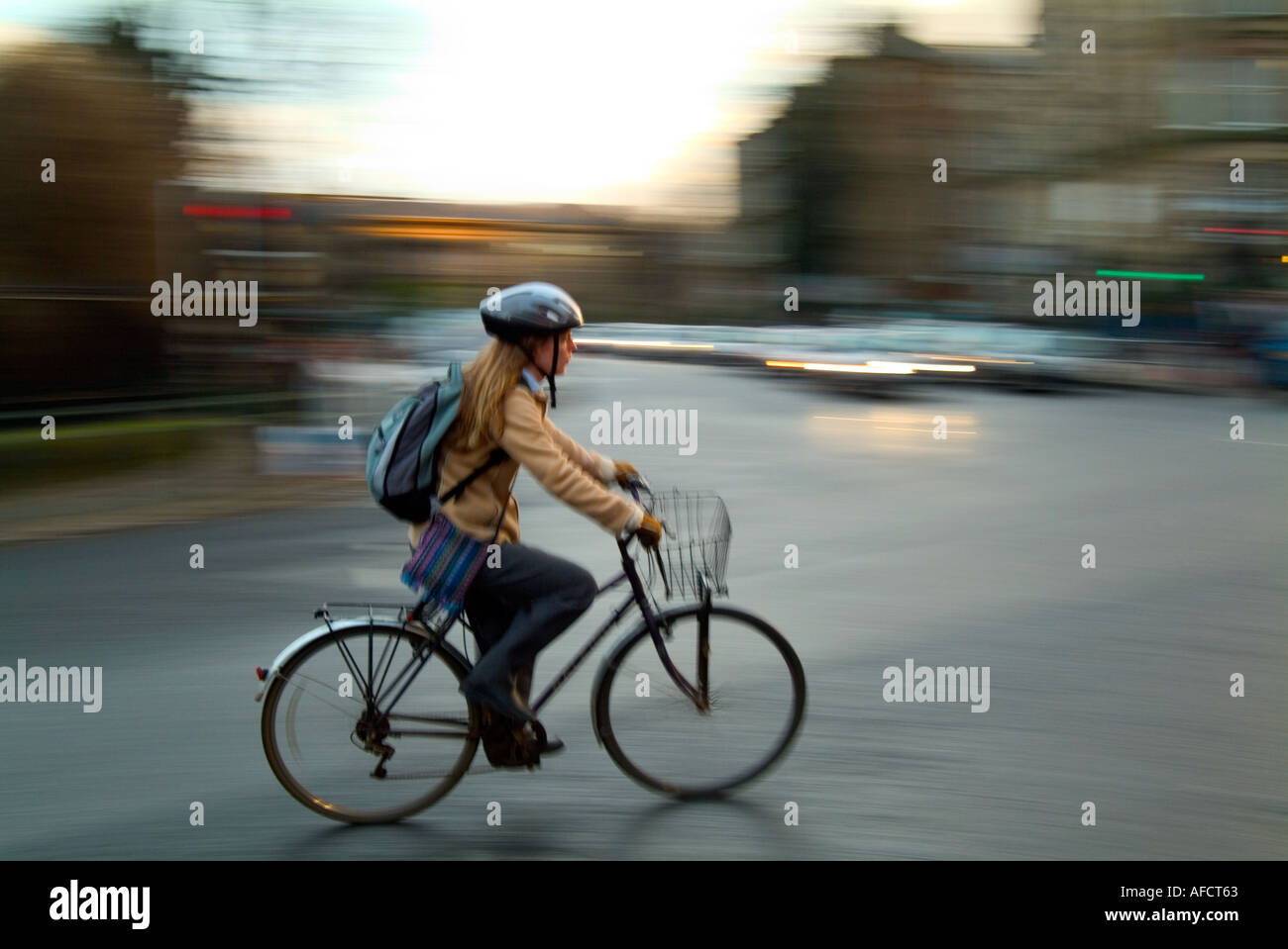 woman riding her bike to work during rush hour Stock Photo - Alamy