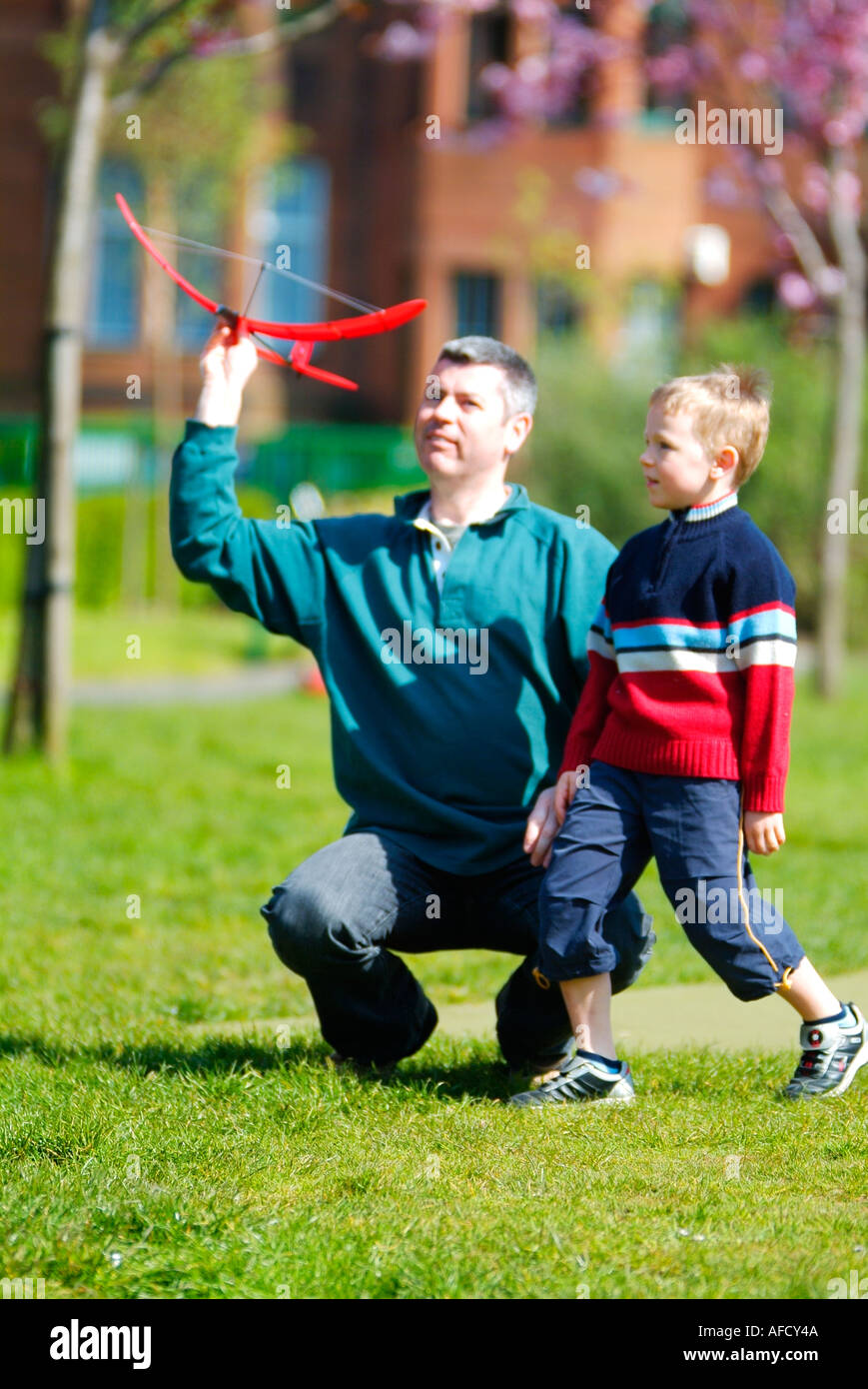 Son showing model airplane hi-res stock photography and images - Alamy