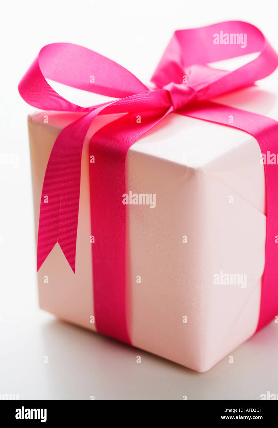 Pink present with pink bow Stock Photo - Alamy