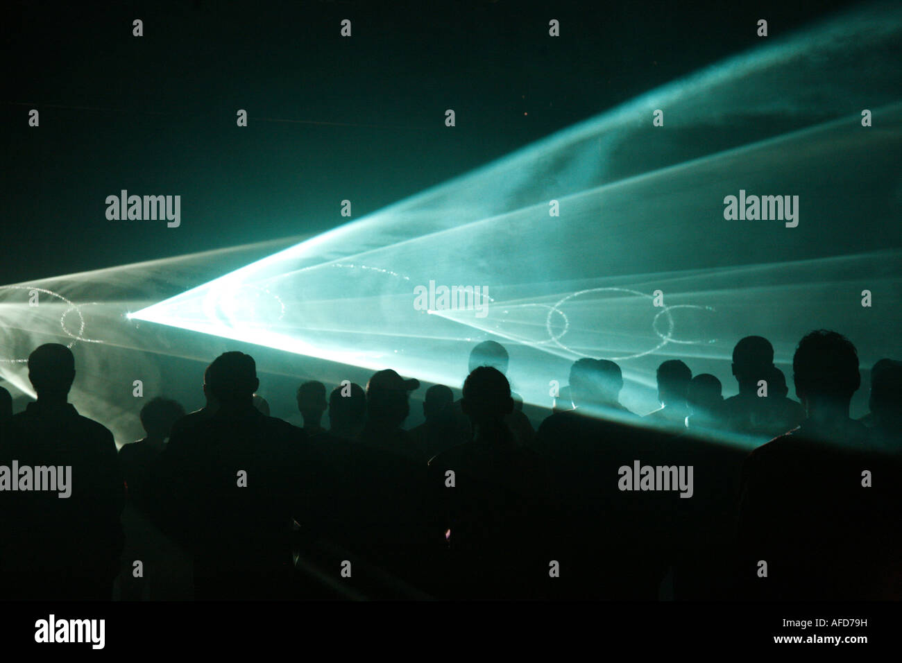 People on the laser light show Stock Photo - Alamy