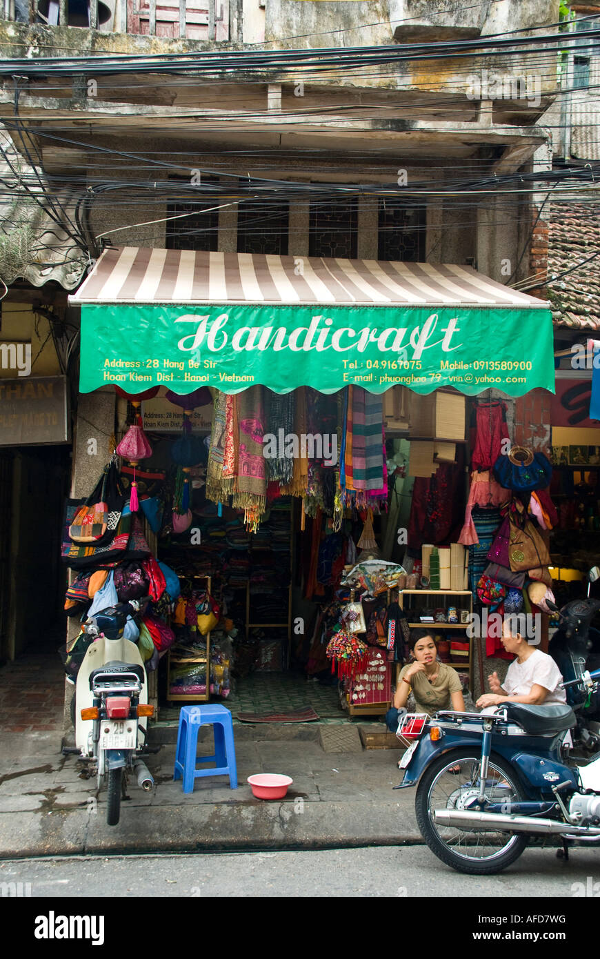 Typical street scene of shopfront, Vietnam Stock Photo - Alamy