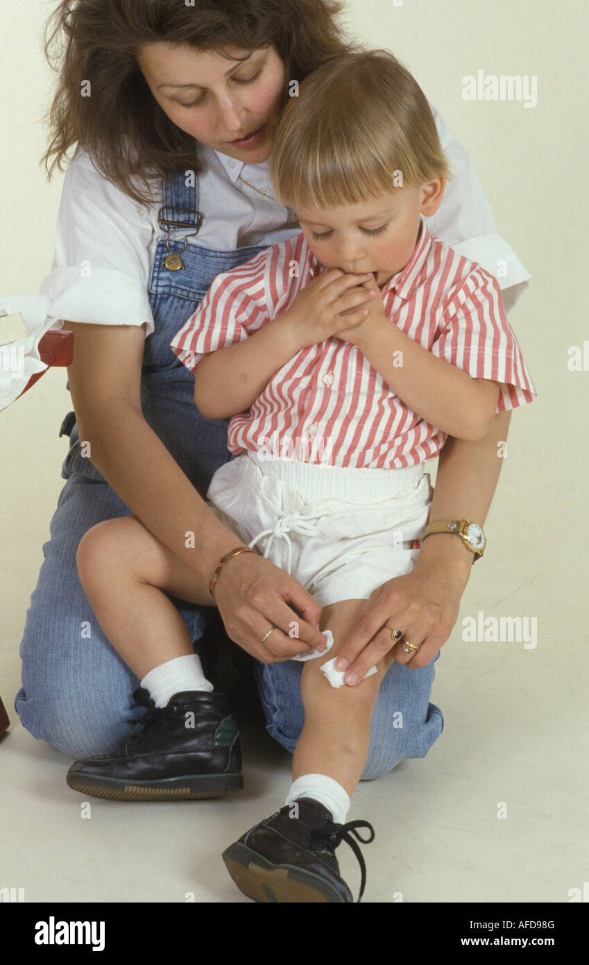 Child grazed knees hi-res stock photography and images - Alamy