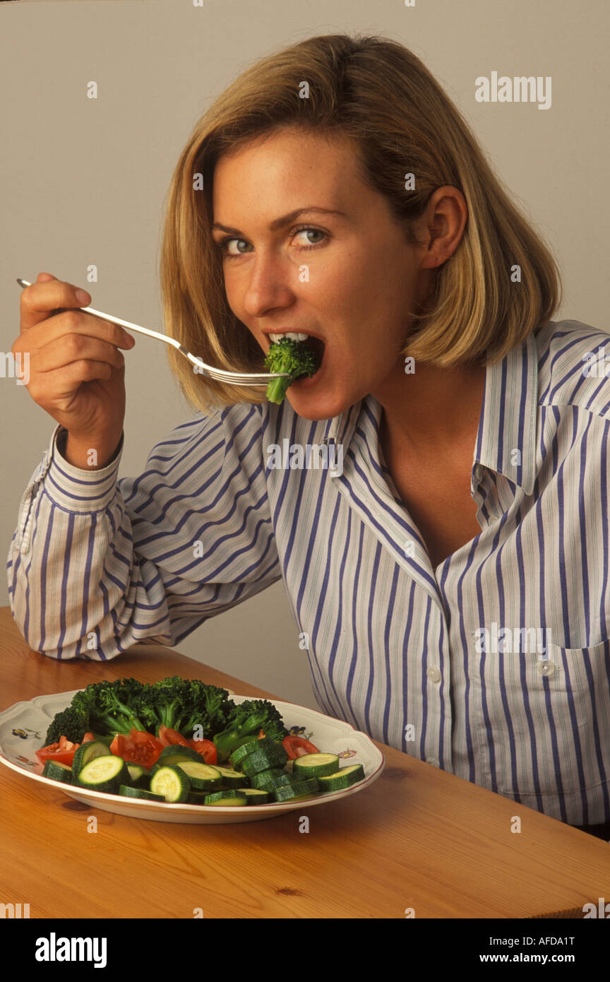 Woman courgettes hi-res stock photography and images - Alamy