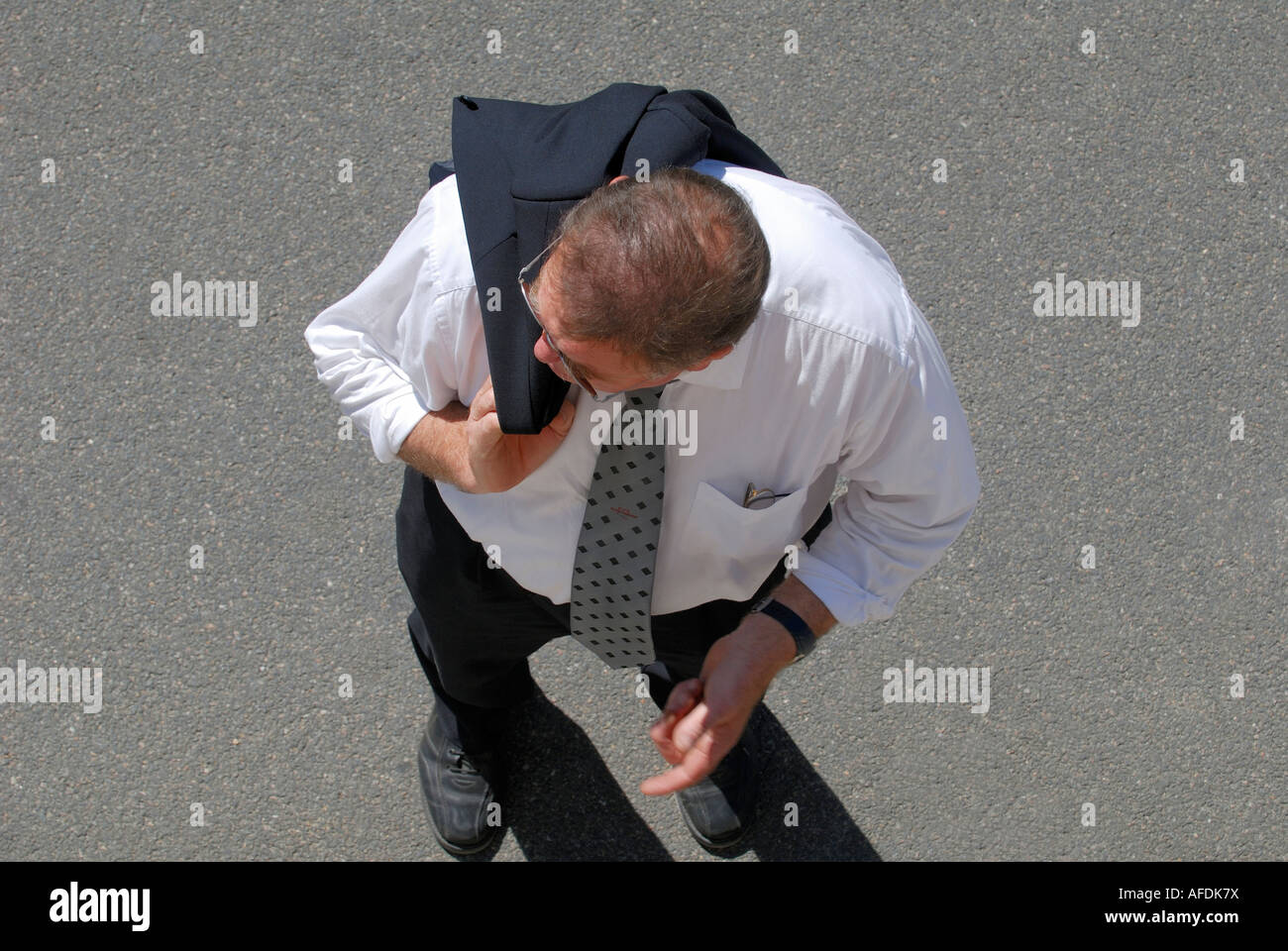 Man carrying jacket over shoulder hi-res stock photography and images ...