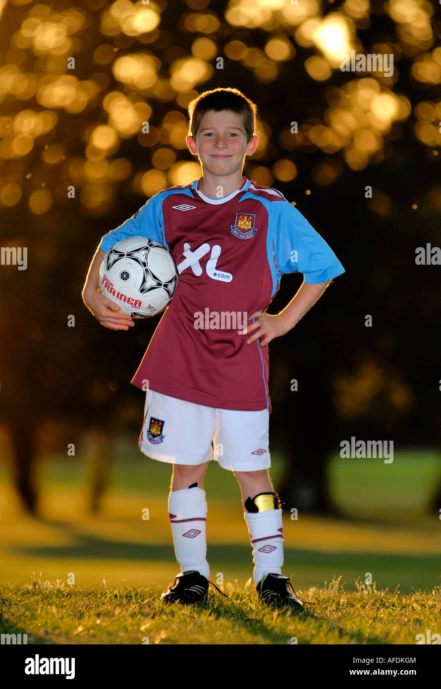 Boy wearing football kit hi-res stock photography and images - Alamy