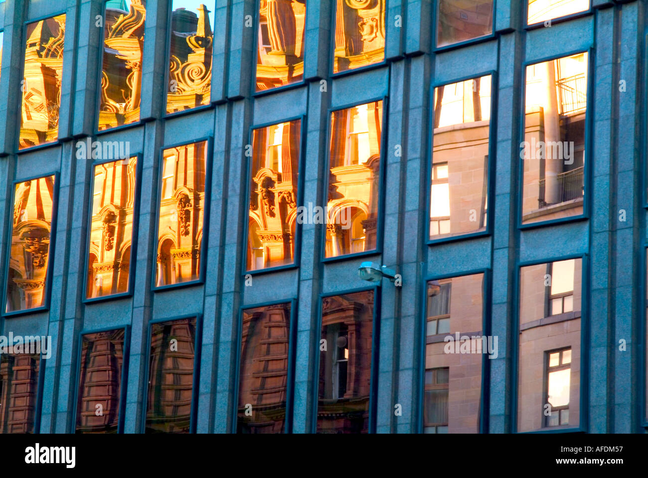 reflections in mirrored business office windows Stock Photo - Alamy