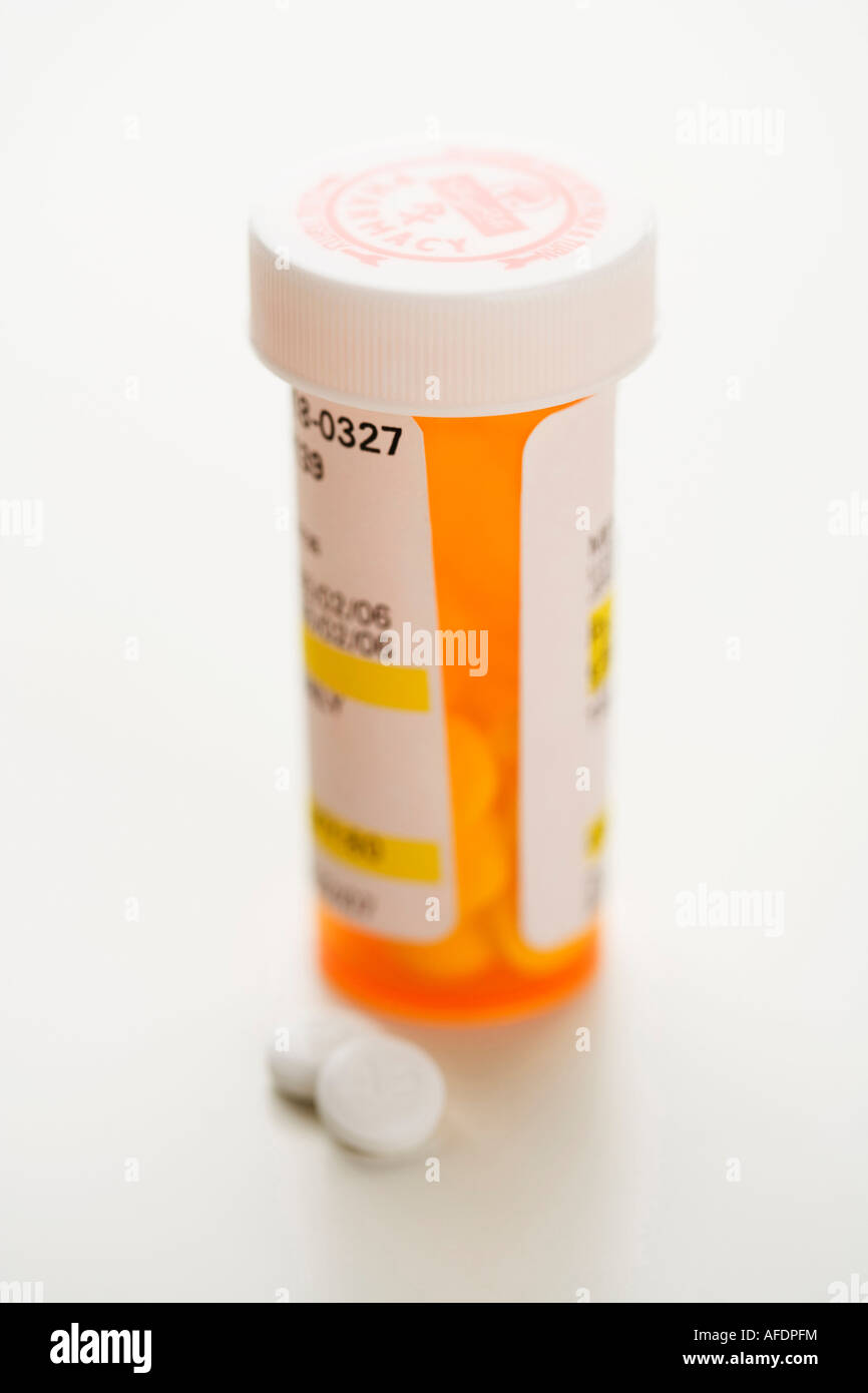 Pill bottle with pills Stock Photo - Alamy
