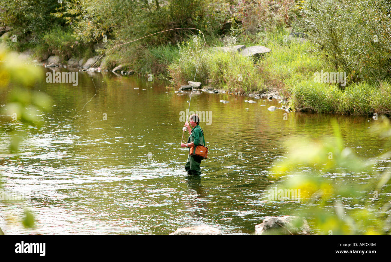 fisherman fly fishing on the river taff wales uk england Stock Photo ...