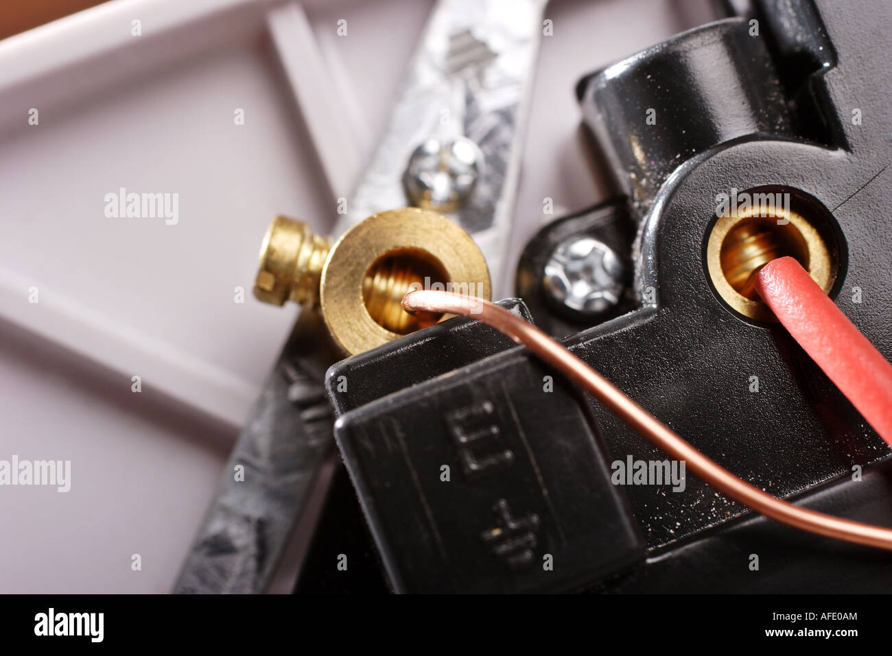 Rear view of 3 pin Electrical socket wiring Stock Photo - Alamy