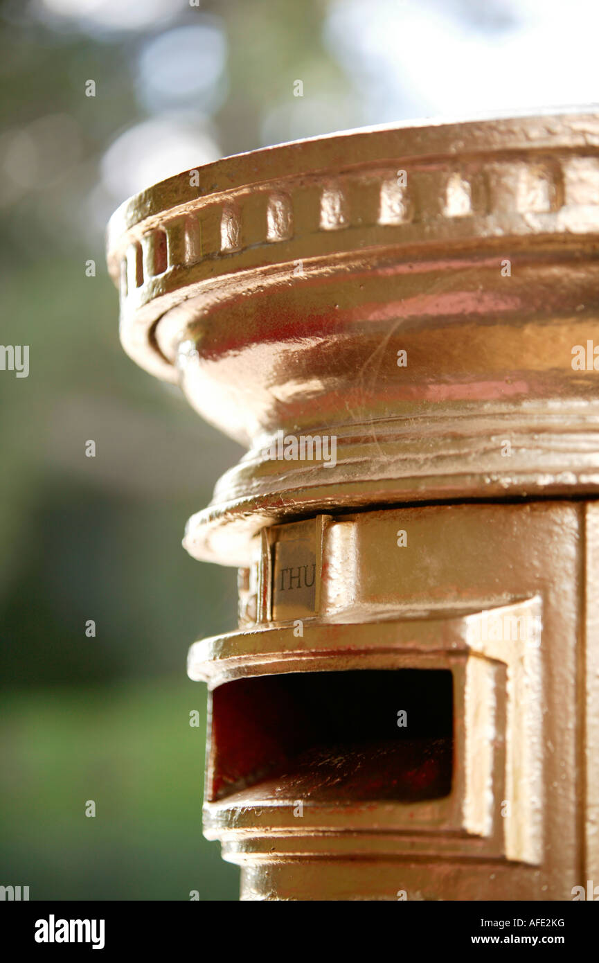Posting Slot on Post Box Painted Gold, Norwich, UK Stock Photo - Alamy