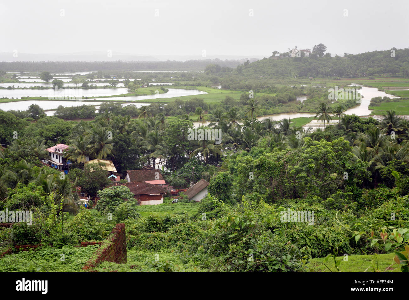 Batim village and background of prawn farms during monsoon used as salt ...
