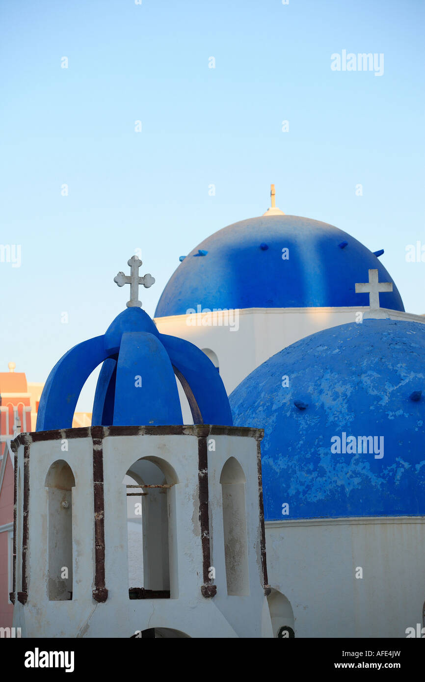 three blue painted church domes in oia santorini greece Stock Photo - Alamy