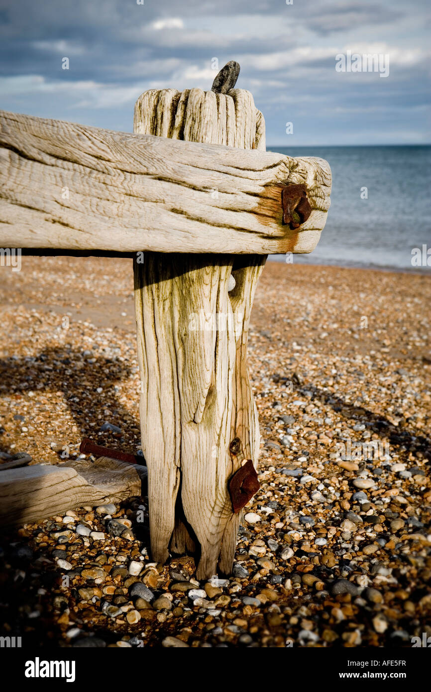 Wooden groyne on a shingle beach Stock Photo - Alamy