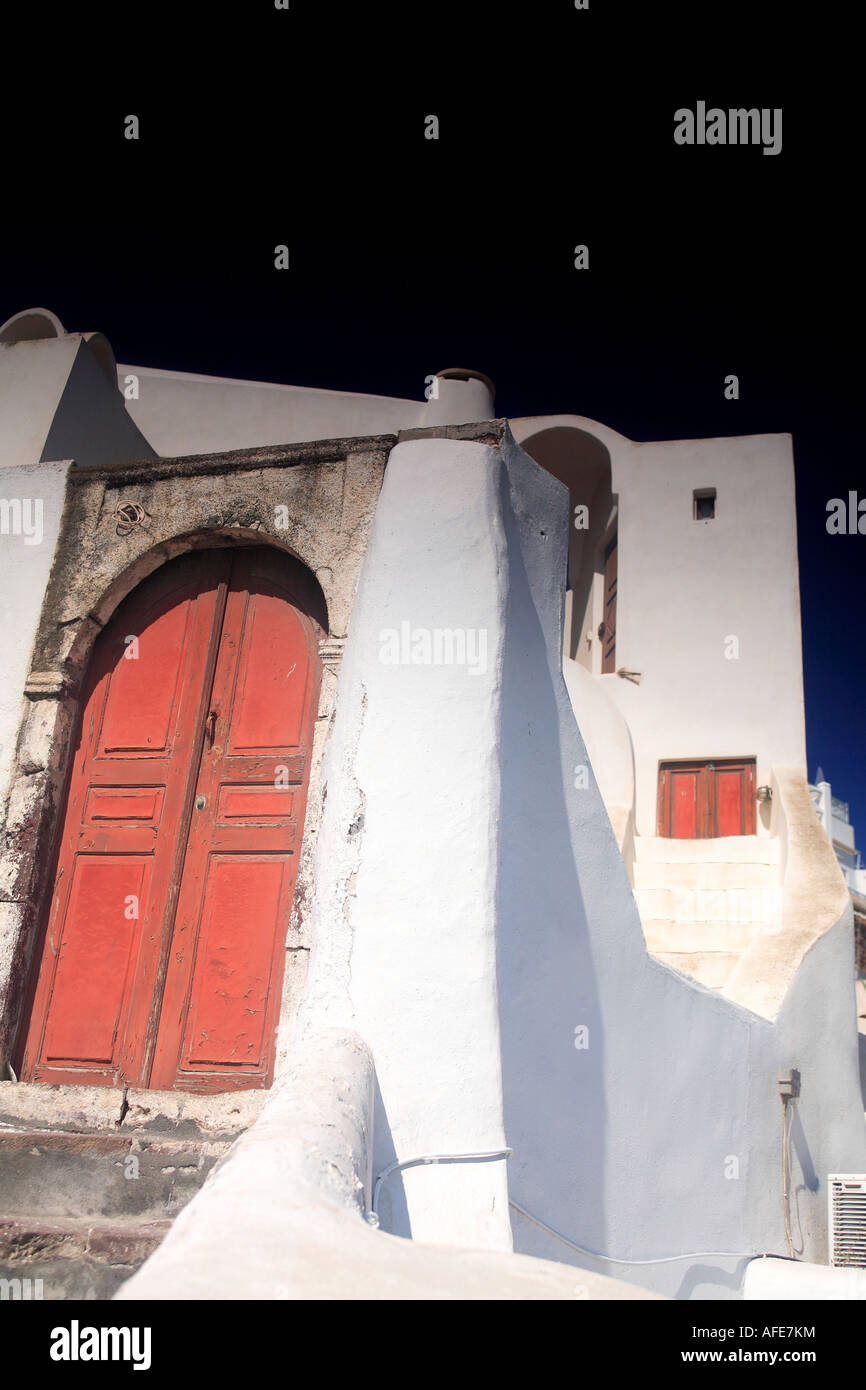 red painted arched doors at top of stone staircase Stock Photo - Alamy