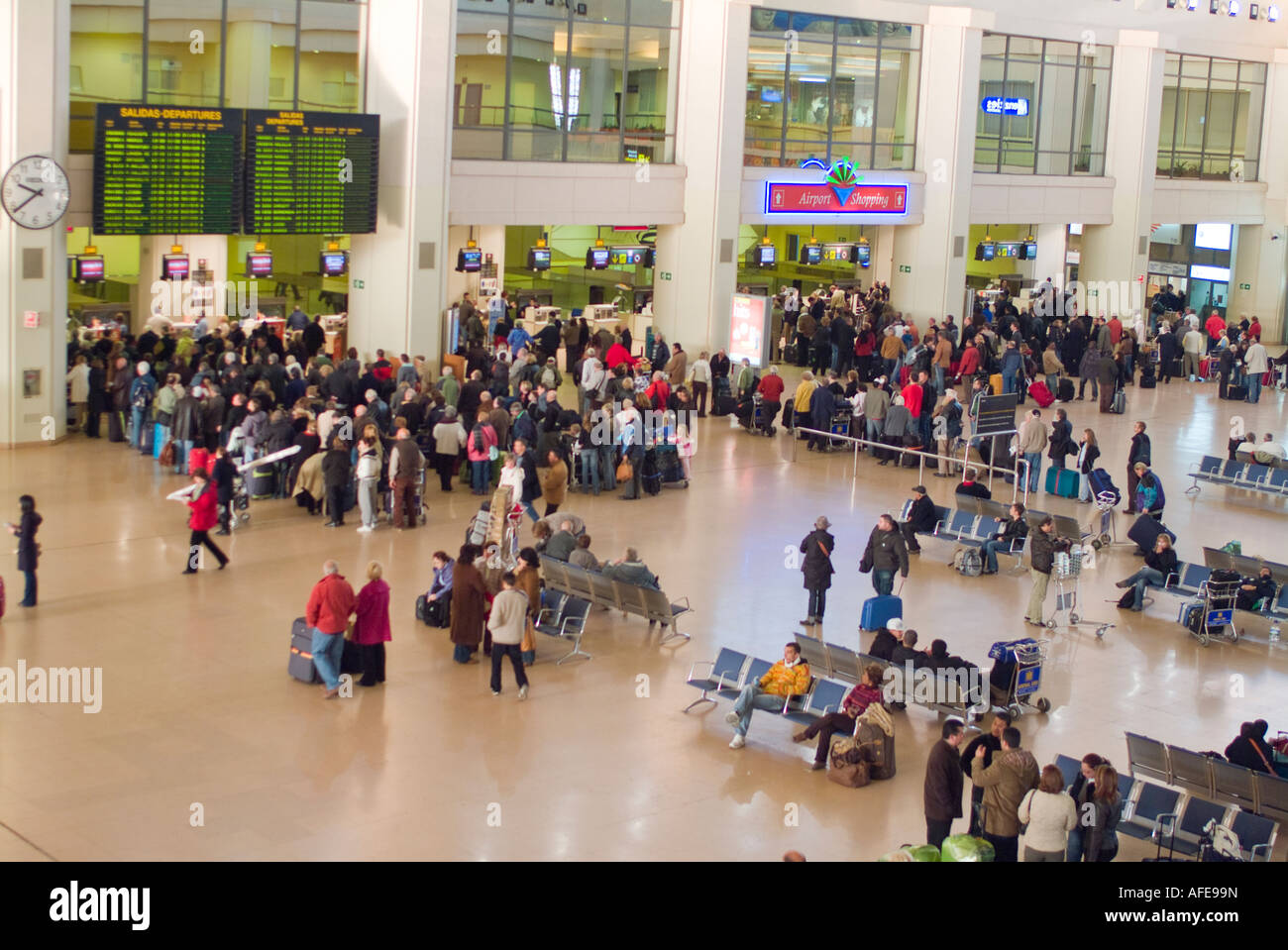 Passengers in terminal of airport at Malaga Spain Stock Photo - Alamy