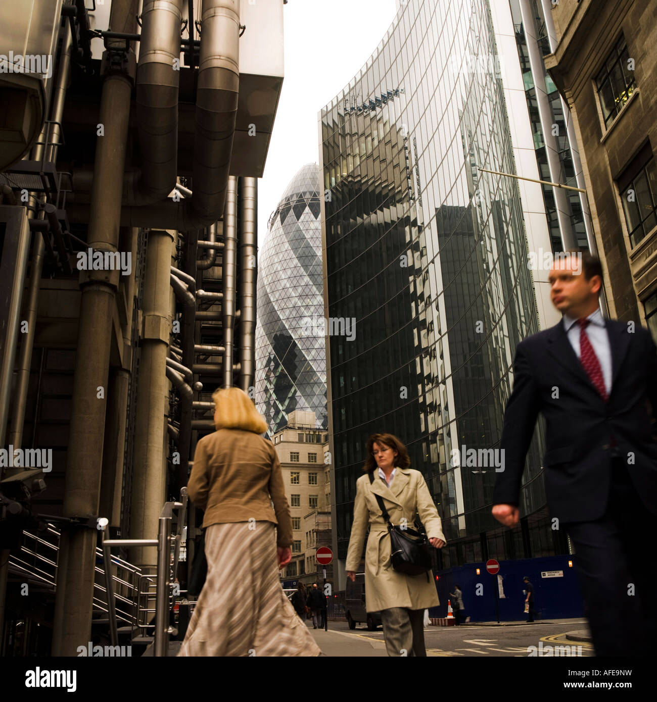City workers outside Lloyds London England UK Stock Photo - Alamy