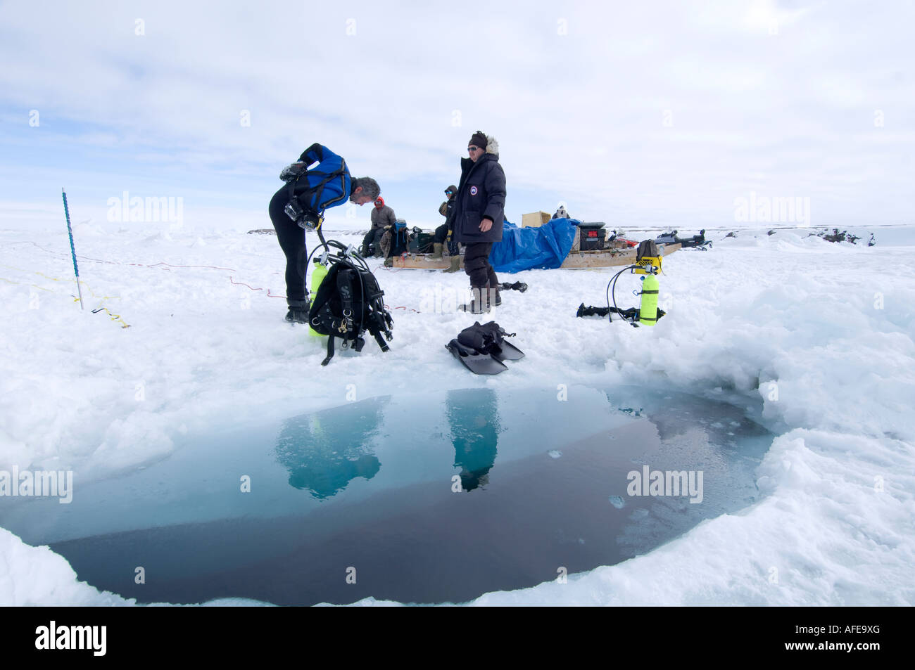 Tourists preparing for a dive in the Canadian high Arctic The divers ...