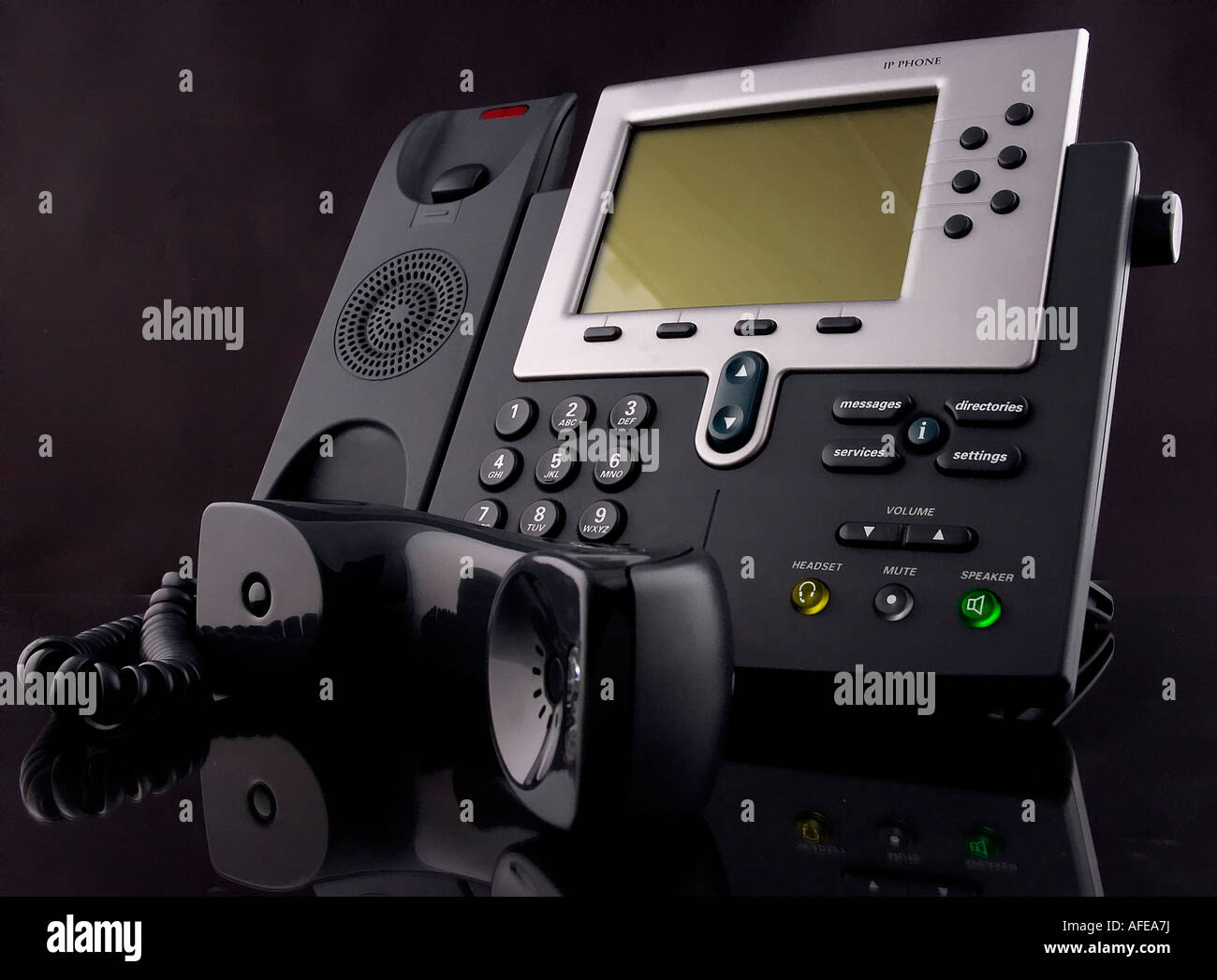 IP phone on a black background Stock Photo - Alamy