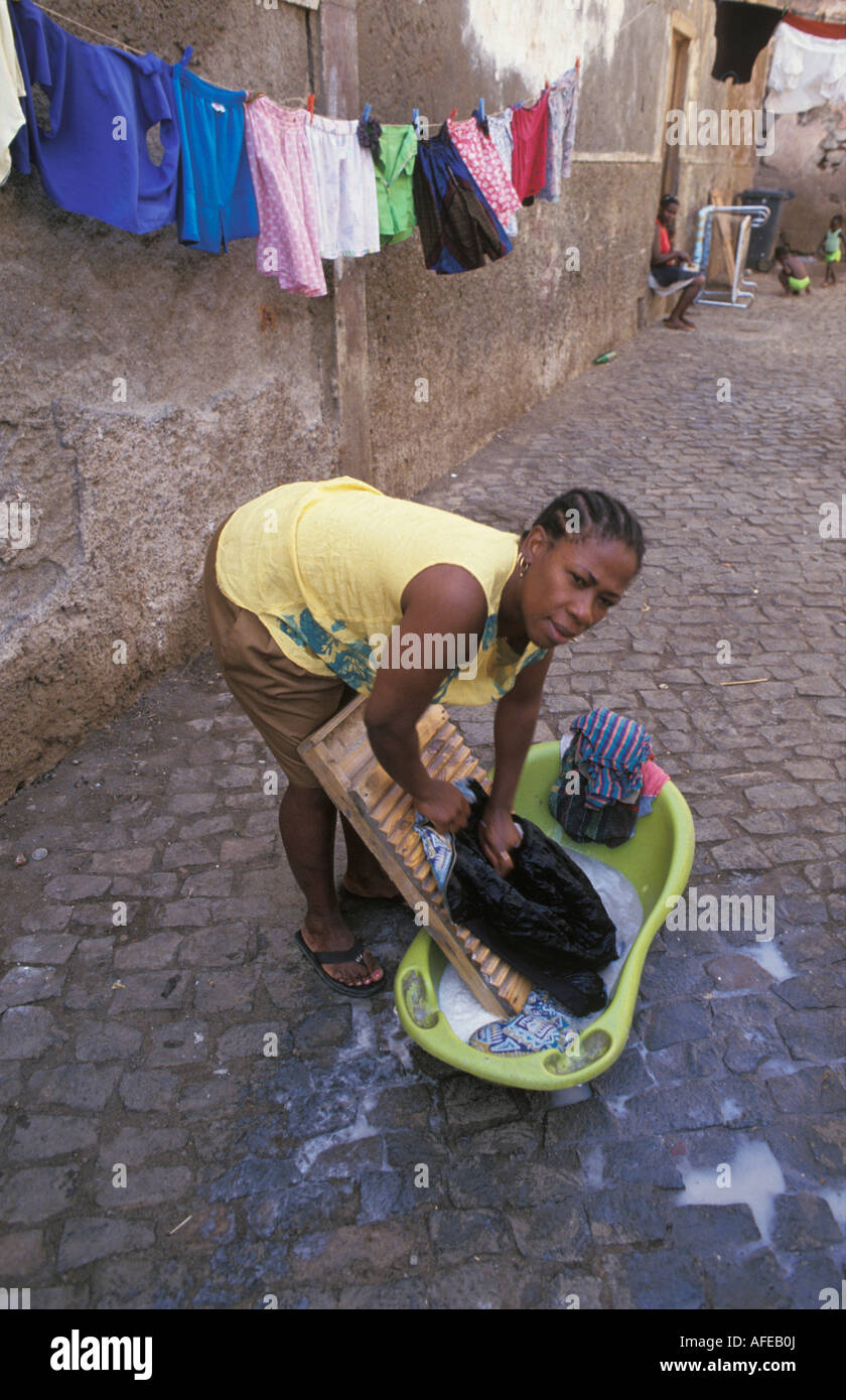 Woman laundry bending hi-res stock photography and images - Alamy