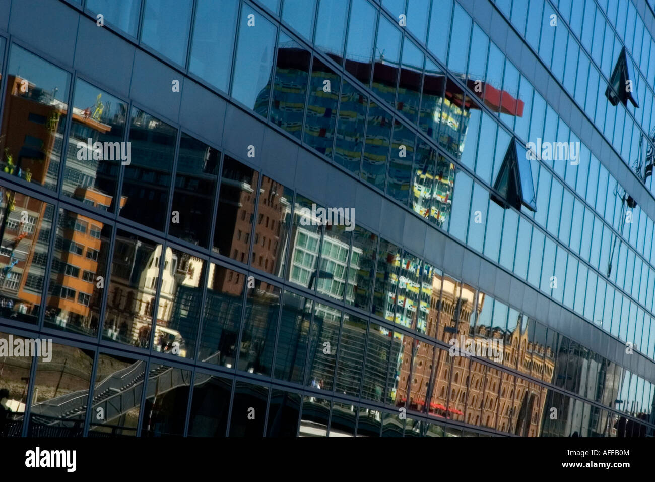 Tower mirrored in a façade Hochhausspiegelung in einer Fassade Stock ...