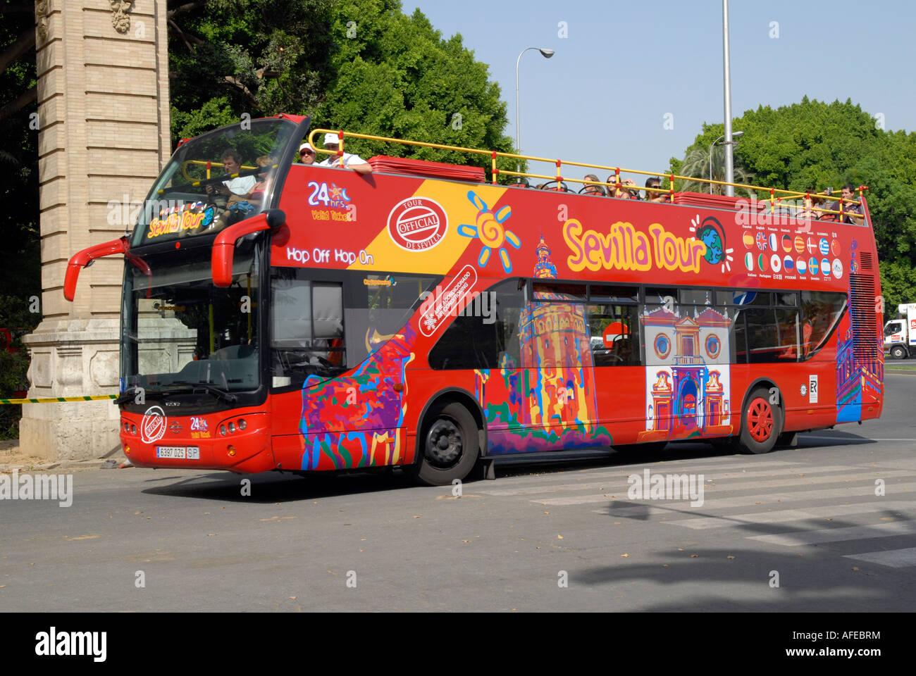 Open top tourist bus in Seville Stock Photo - Alamy