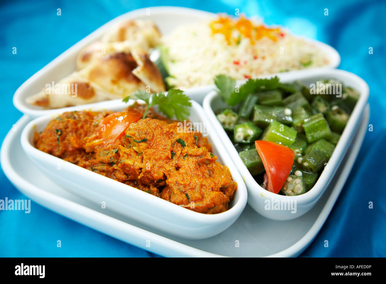 Indian lunch set meal, curry, ocra,rice and naan Stock Photo - Alamy