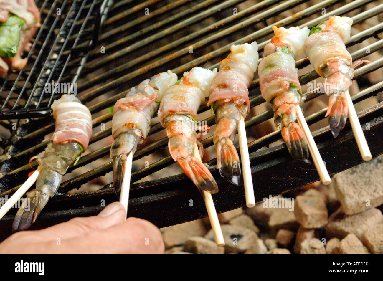 Bacon wrapped prawns hi-res stock photography and images - Alamy