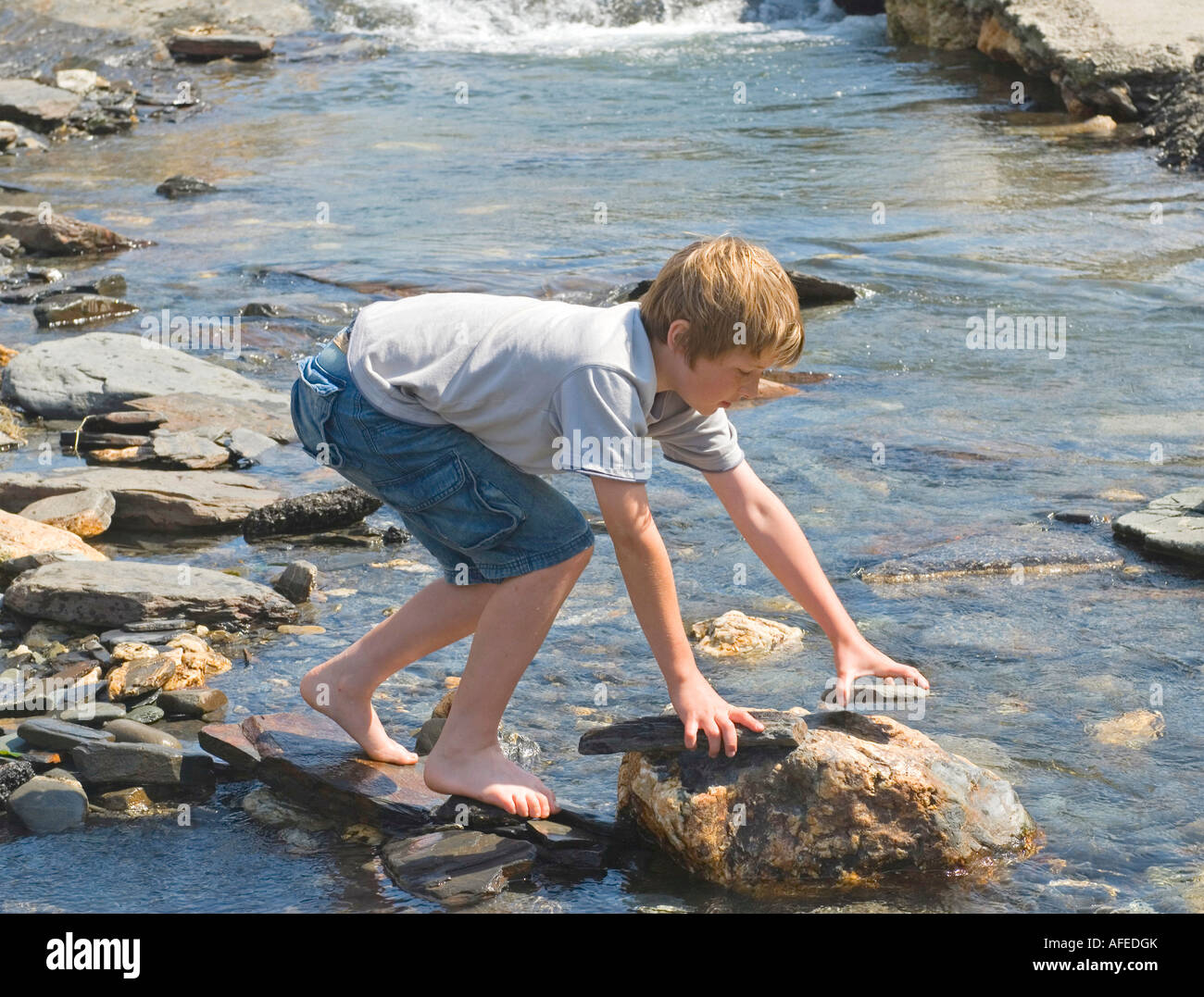 Stream boy hi-res stock photography and images - Alamy