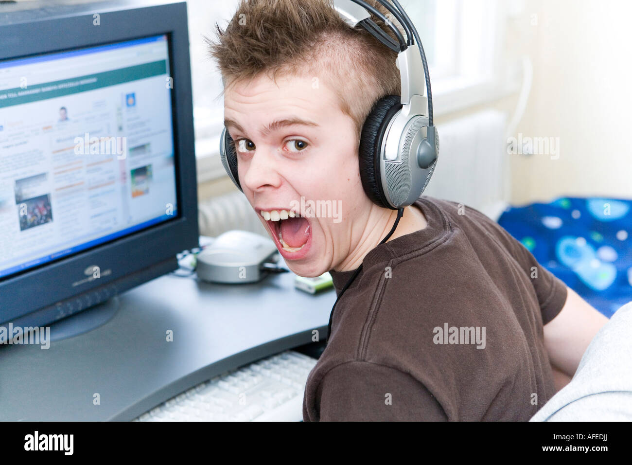 Asian teen boy shocked expression hi-res stock photography and images ...