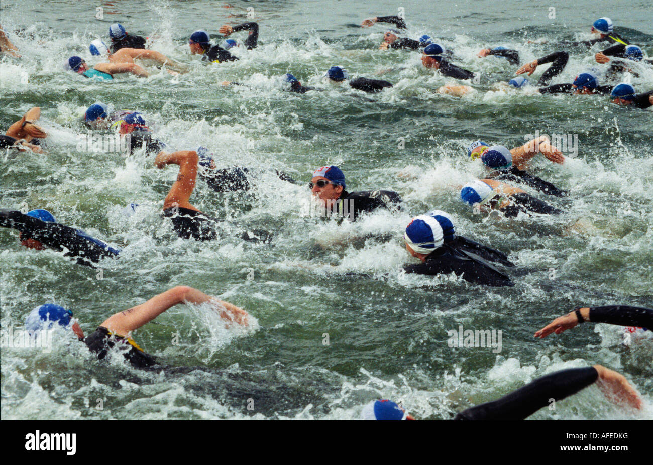 group of swimmers in triathlon competition Stock Photo - Alamy
