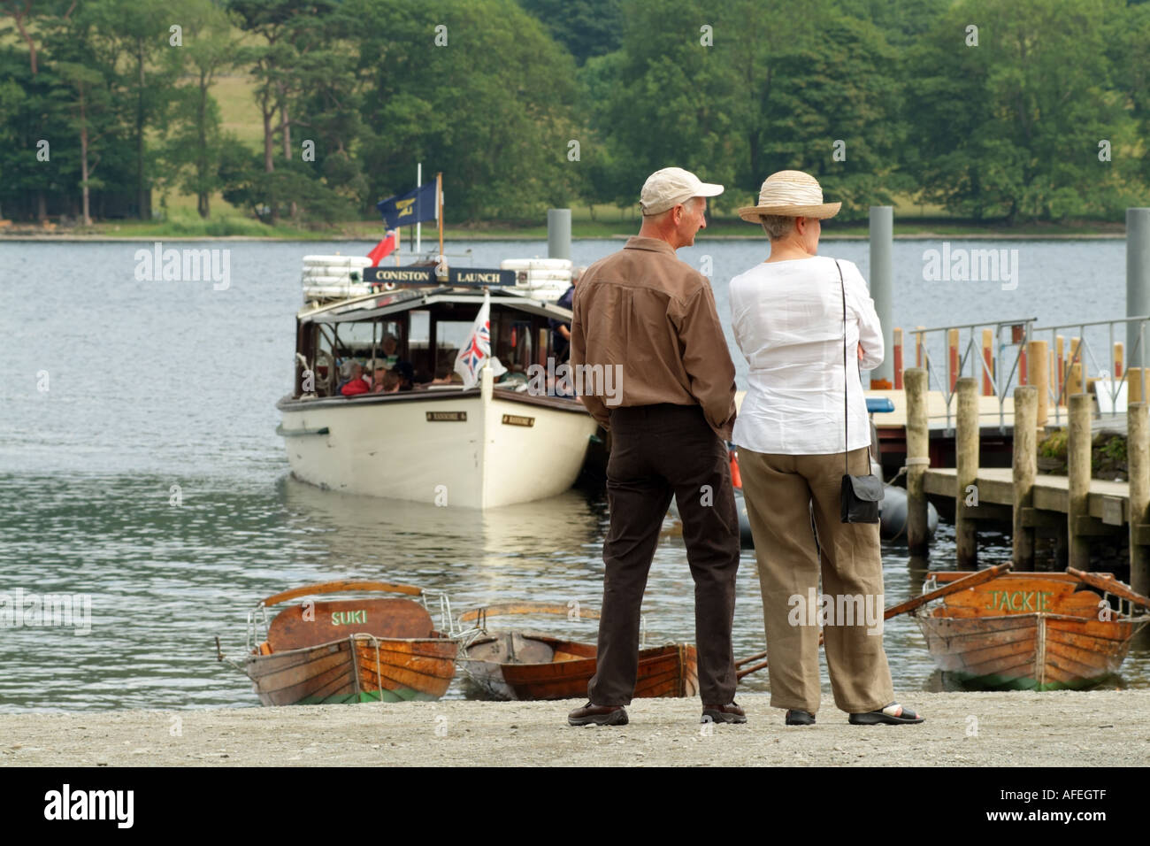 Coniston Water in The Lake District northern England UK. Holidaymakers ...
