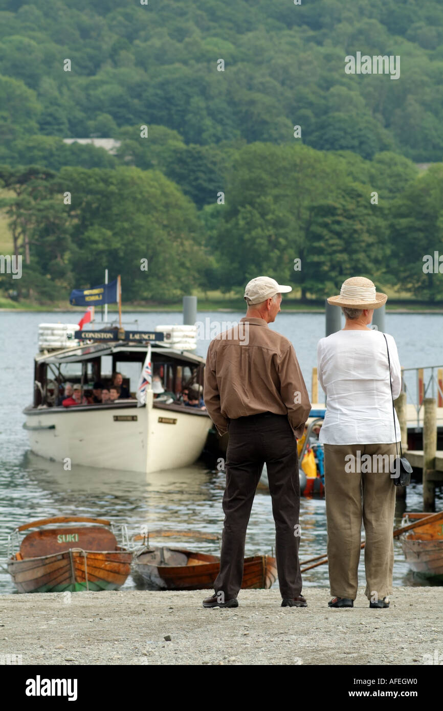 Coniston Water in The Lake District northern England UK. Holidaymakers ...