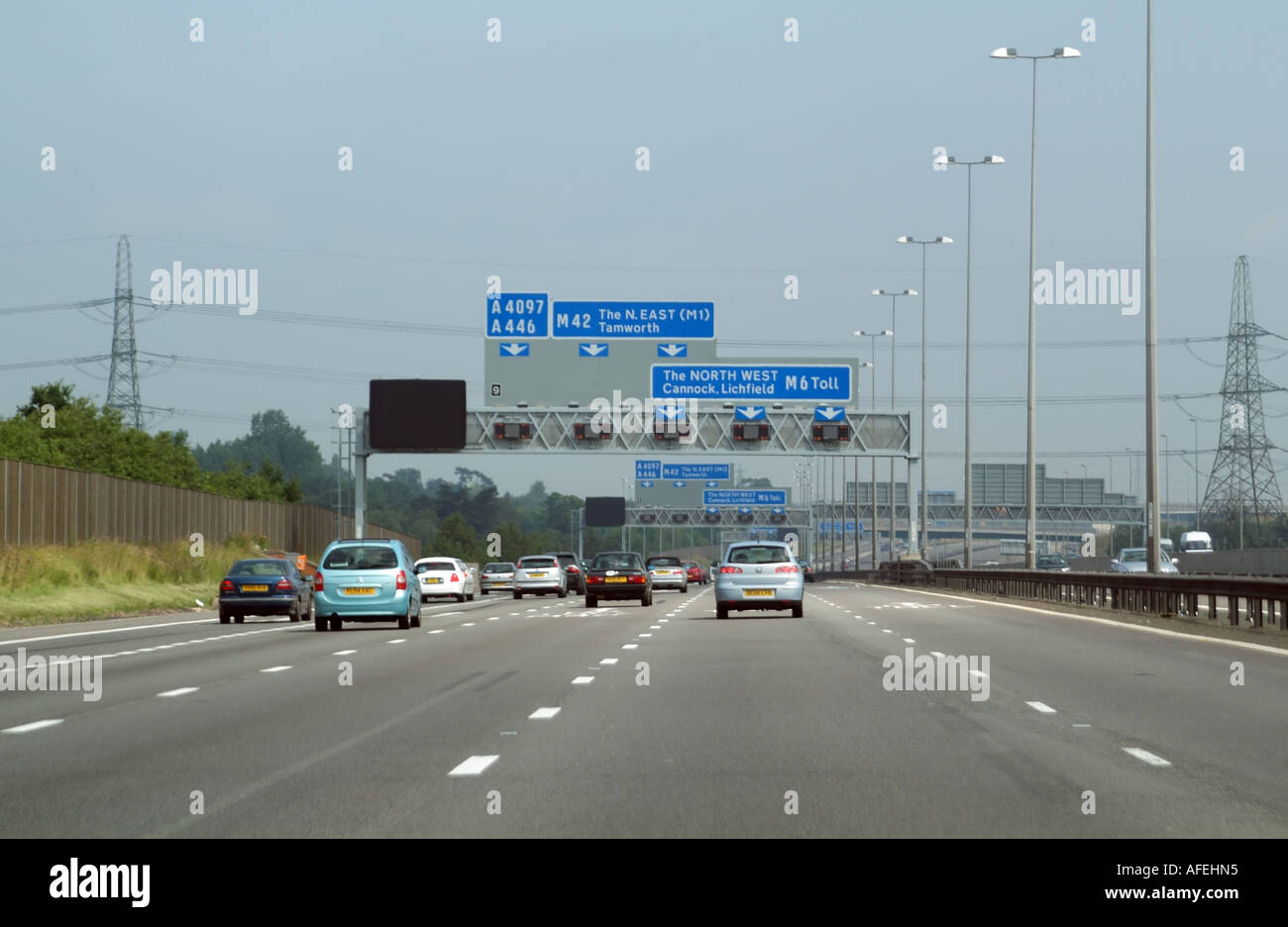 M6 motorway near Birmingham central England UK. Road signs for the ...