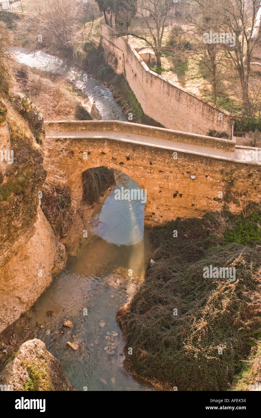 PUENTE VIEJO THE ANCIENT 1616 BRIDGE AT THE WESTERN ENTRANCE TO THE ...