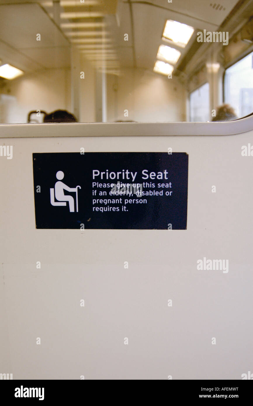 Give up seat train hi-res stock photography and images - Alamy