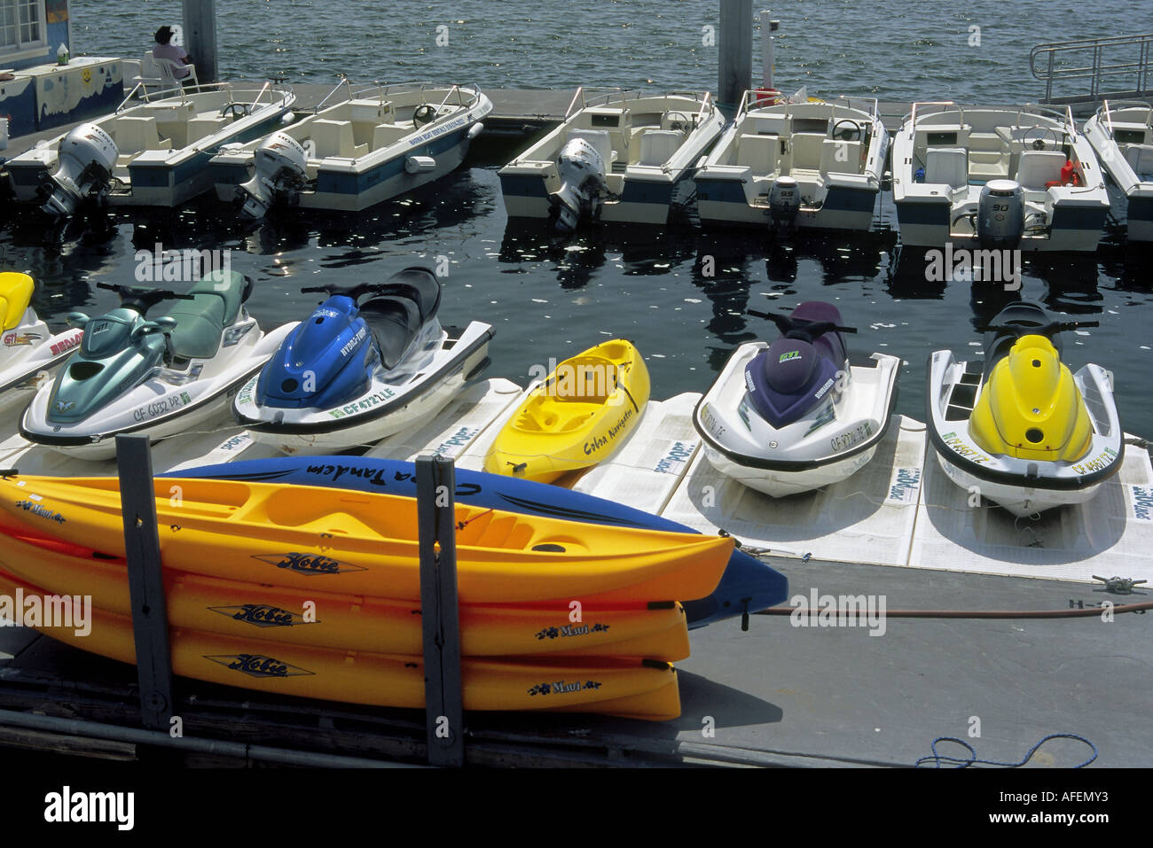 Small recreational boats for rent lined up waiting for customers at ...