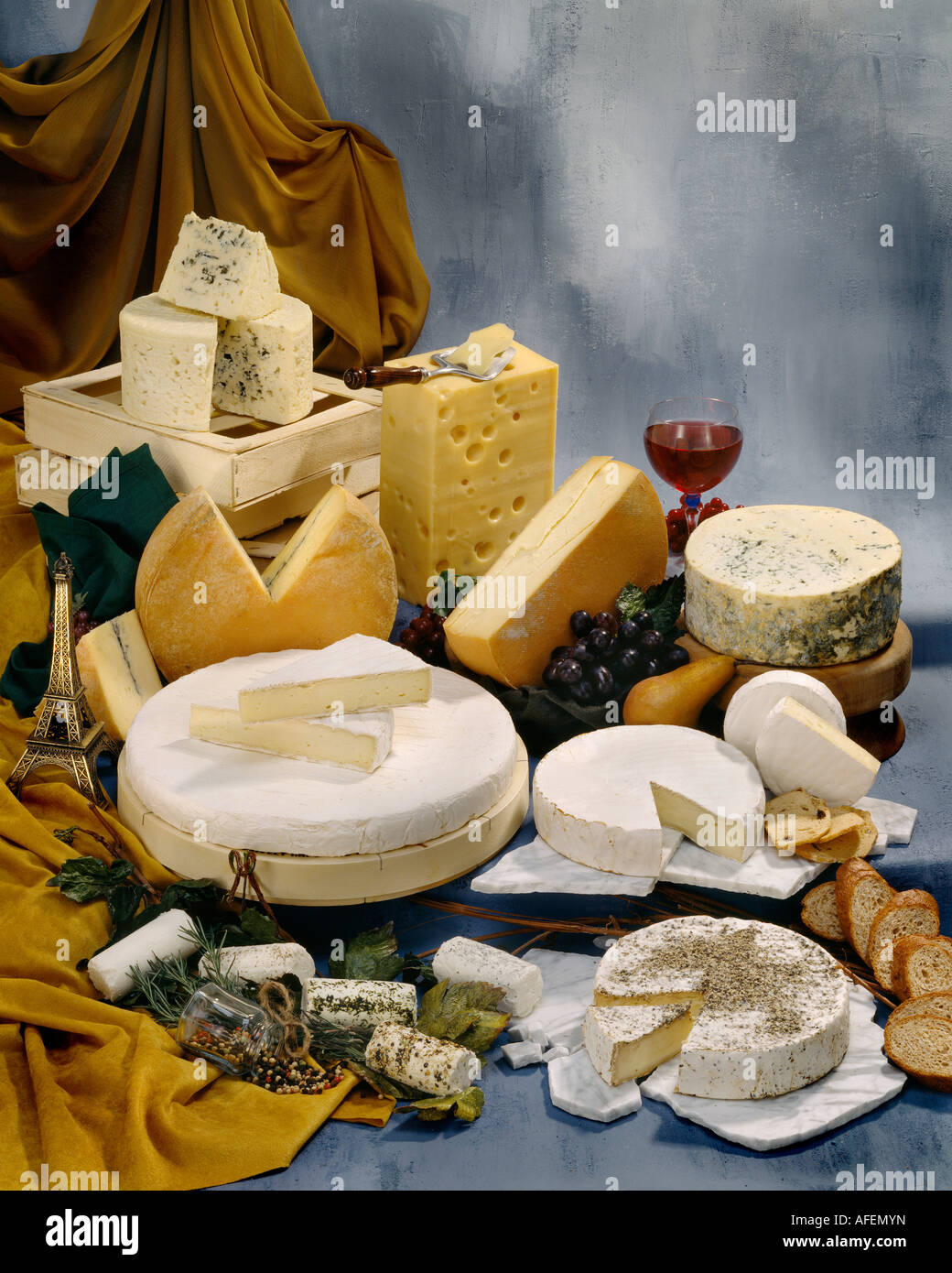 French Cheeses in group color photograph on cool toned mottled ...