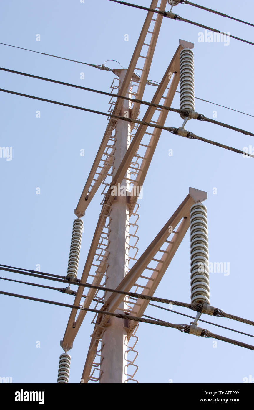 Vertical image of a high tension utility pole and power lines in Orange ...