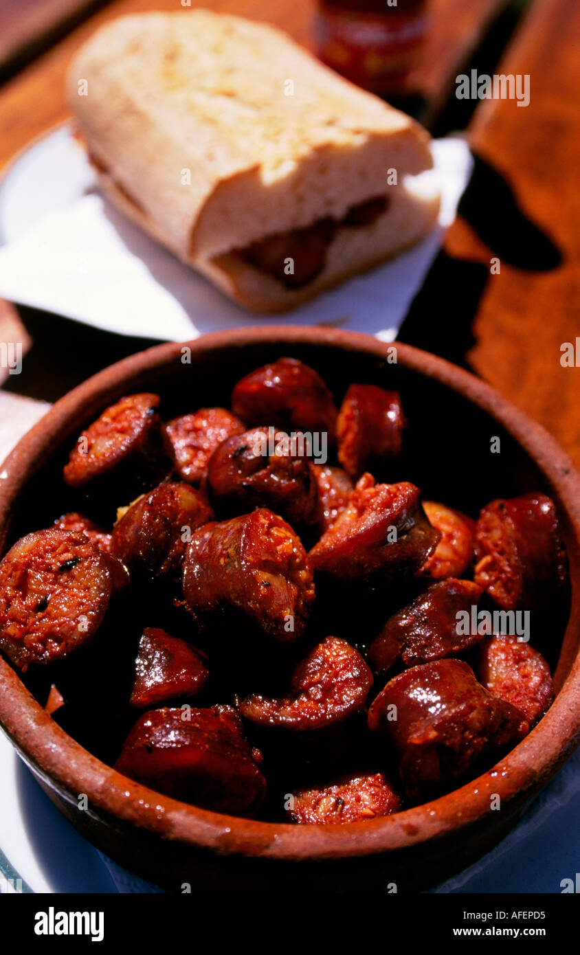 Fried chorizo typical mountain fare served at the Refugio de Aliva ...