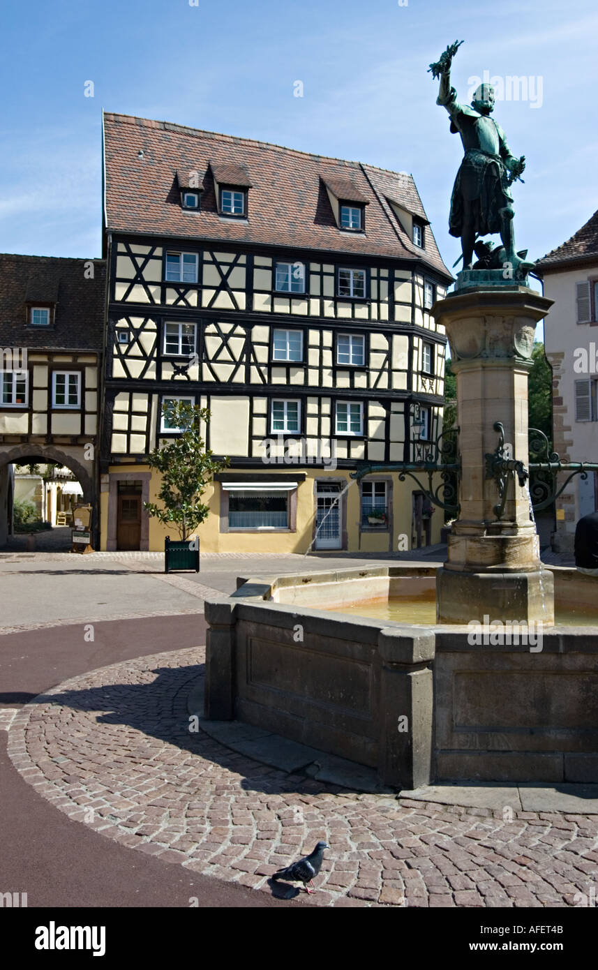 Historic square in the Medieval City of Colmar Alsace with fountain and ...