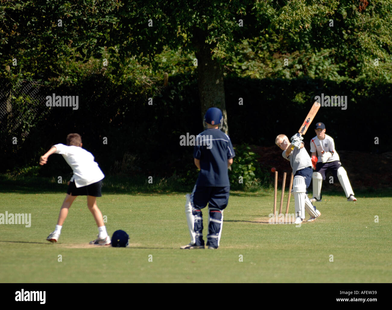 Children playing cricket, UK Stock Photo - Alamy