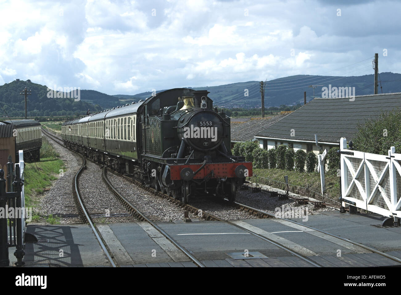 STEAM TRAIN APPROACHING BLUE ANCHOR STATION FROM MINEHEAD SOMERSET ...