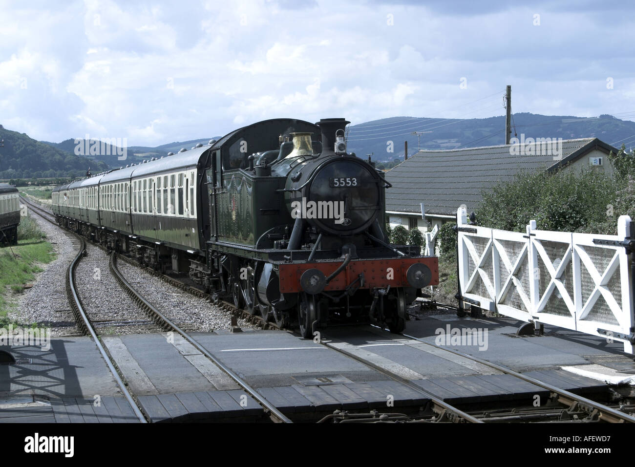 STEAM TRAIN APPROACHING BLUE ANCHOR STATION FROM MINEHEAD SOMERSET STEAM RAILWAY ENGLAND Stock ...