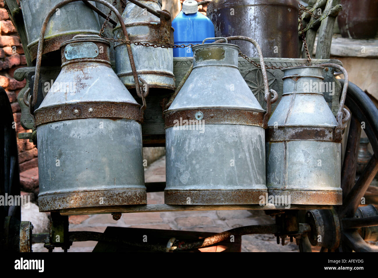 Metallic containers on a wagon Stock Photo - Alamy