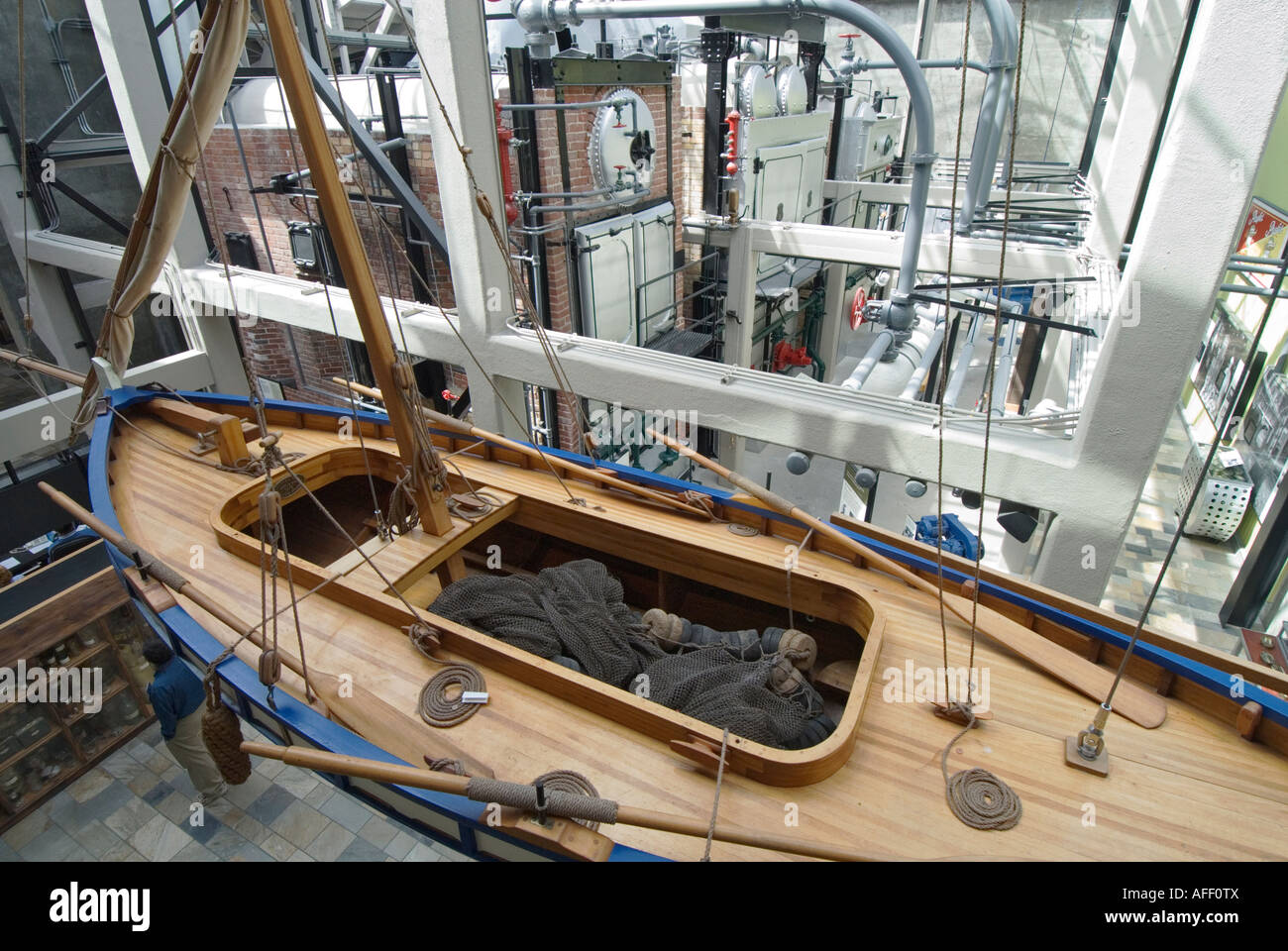 California Monterey Bay Aquarium wooden boat hangs above fish cannery ...