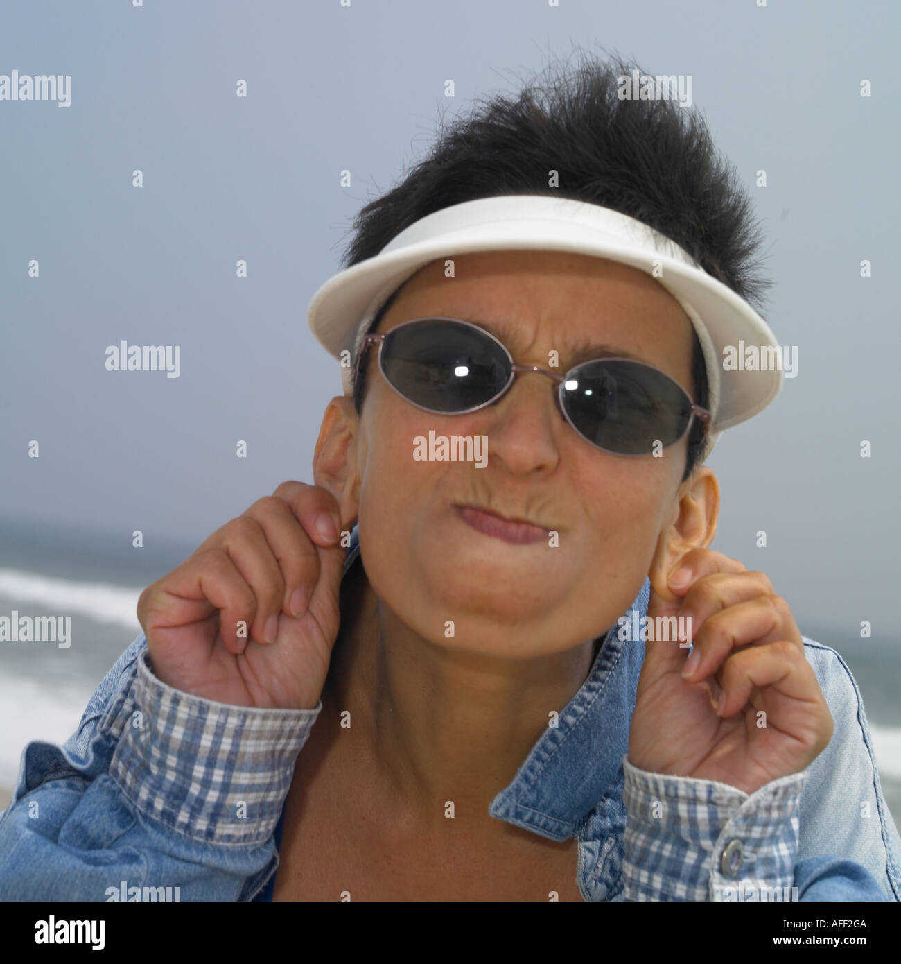 middle-aged woman making a monkey face Stock Photo - Alamy