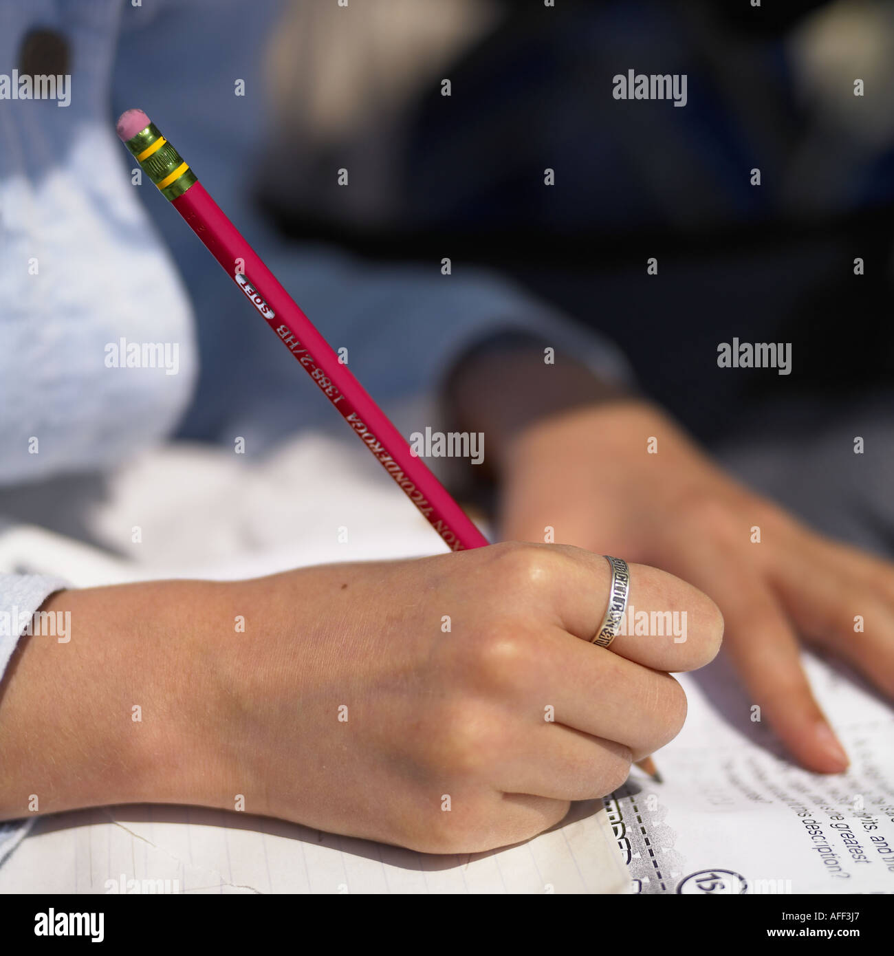 close-up of child's hands writing with a pencil Stock Photo - Alamy