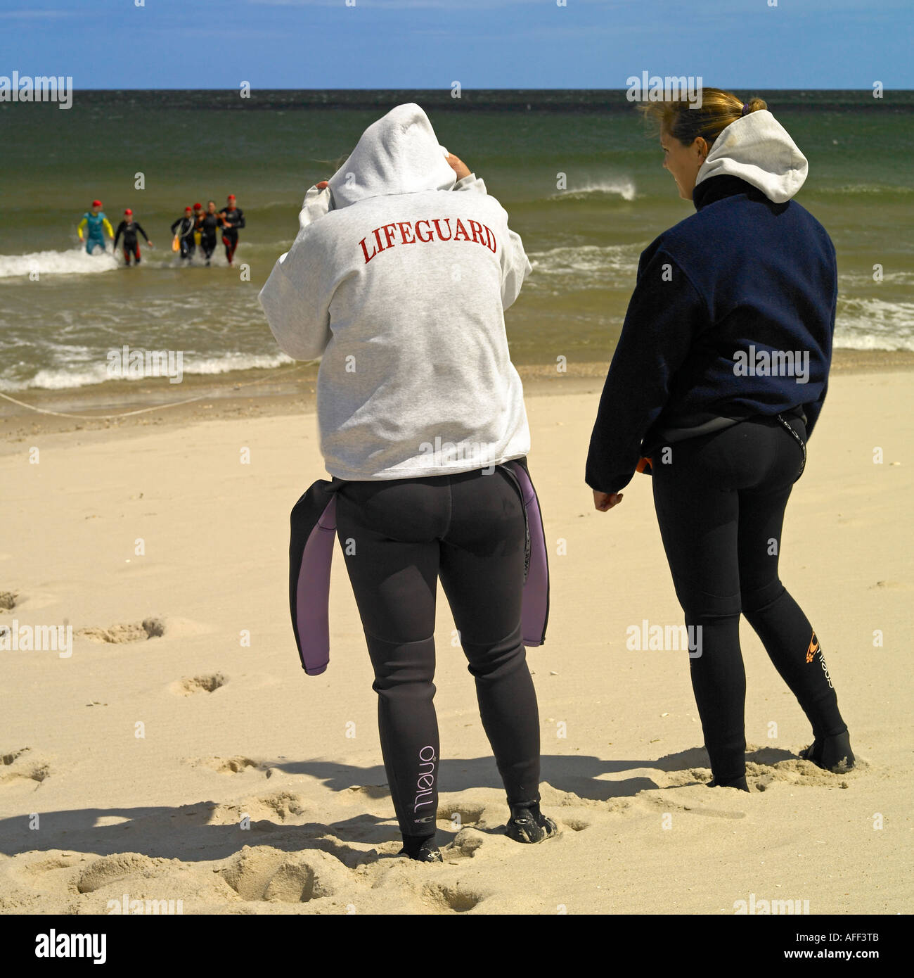 Lifeguards come to the rescue on ocean beach (lifeguards at the beach ...
