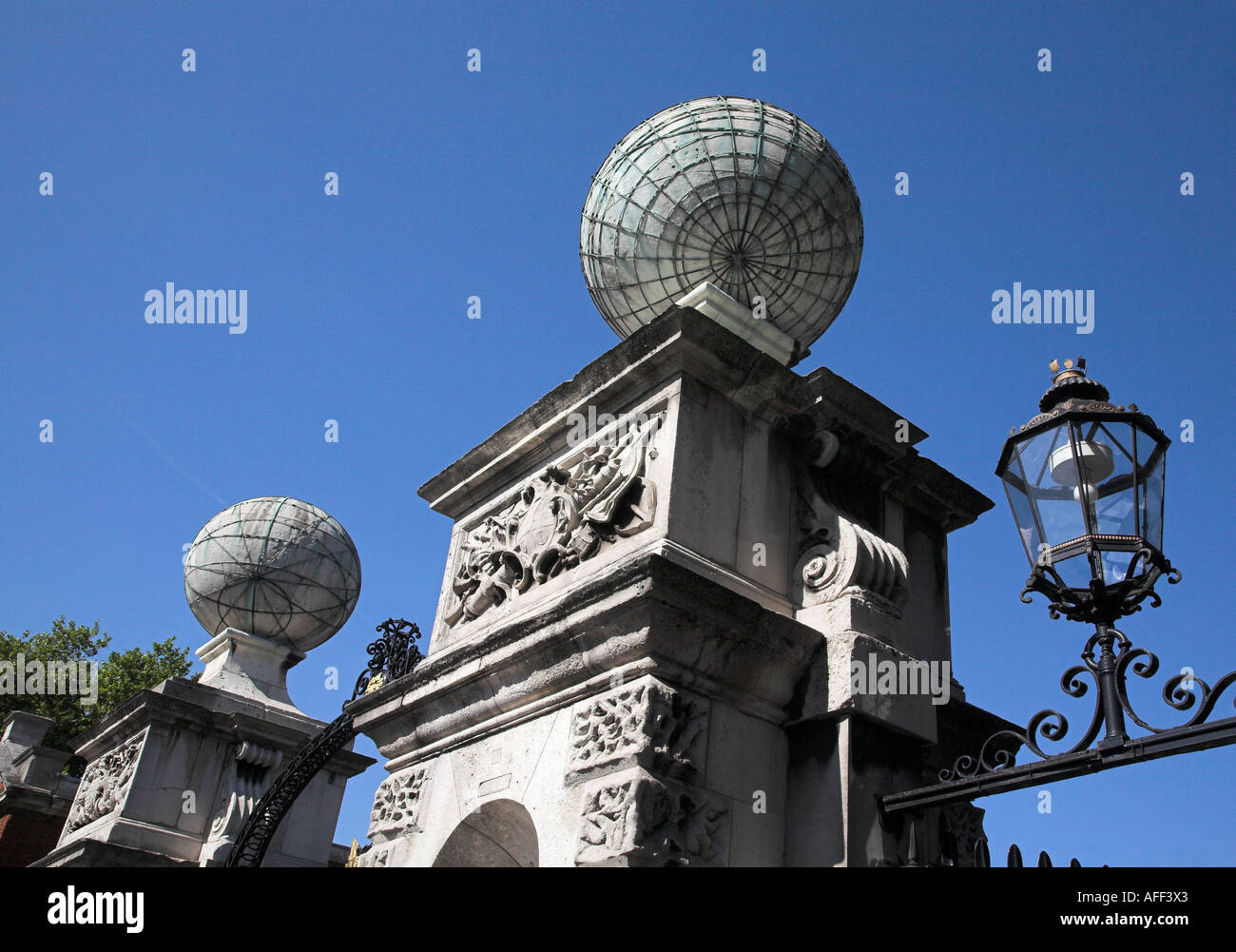 Globe gate posts at Greenwich University campus Stock Photo - Alamy