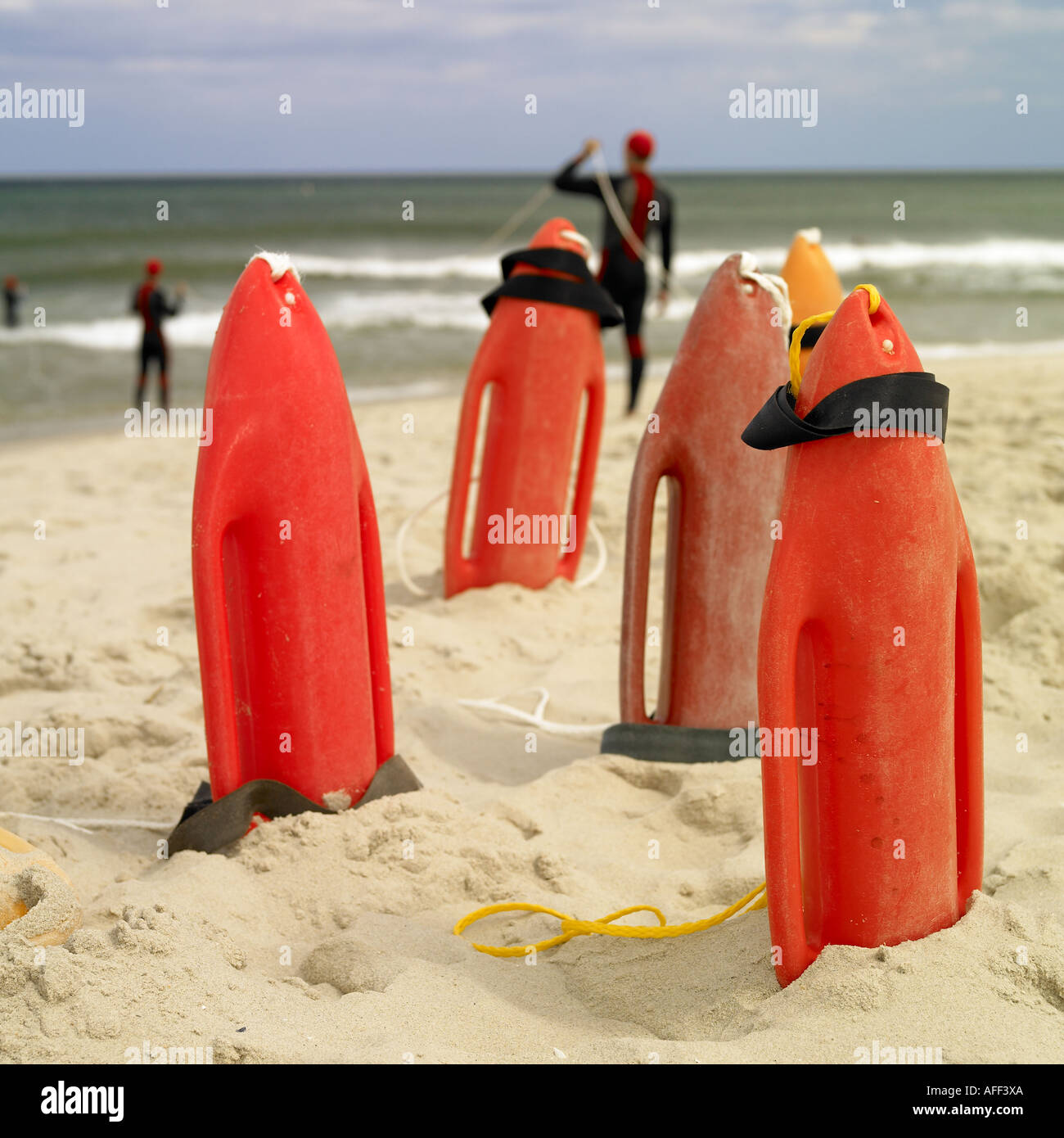 team of lifeguards training at the beach Stock Photo - Alamy